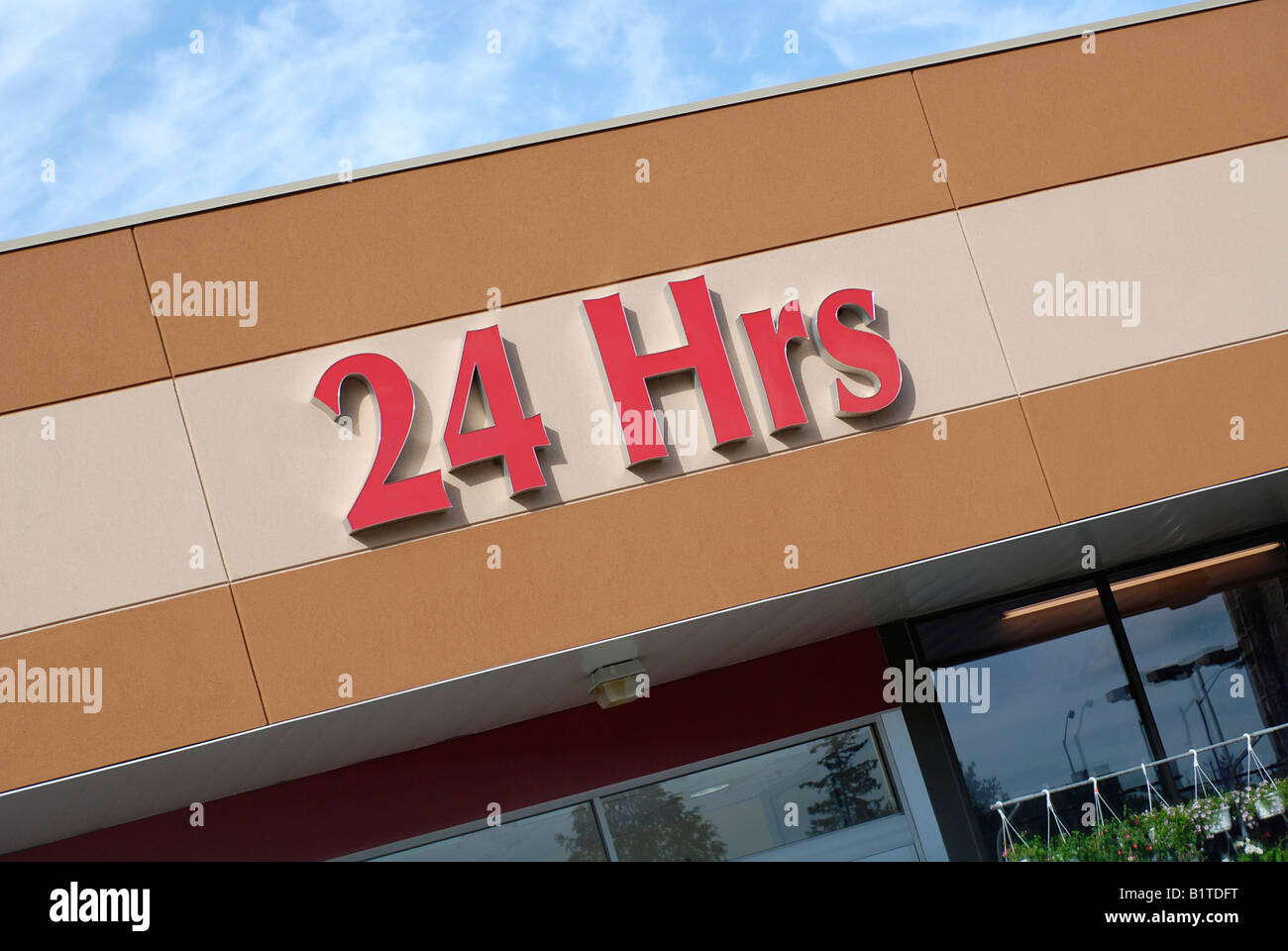 24 Hrs, Store/Supermarket Front Entrance Stock Photo - Alamy