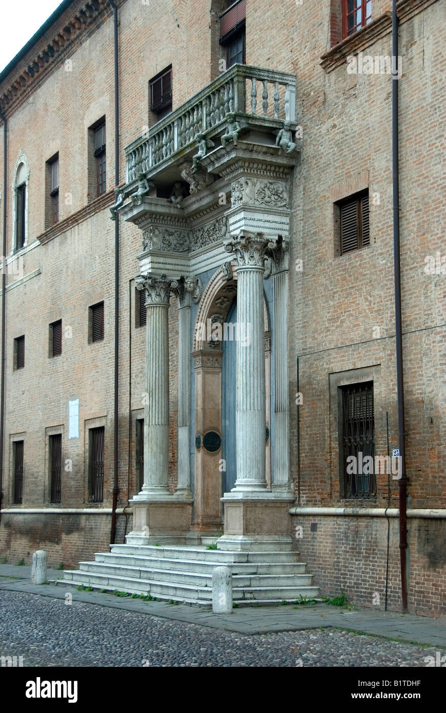 Architectural details of the entrance to anold building in Ferrara ...