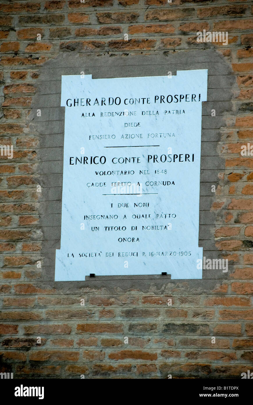 Memorial wall plaque on an old brick building in Ferrara Italy Stock ...