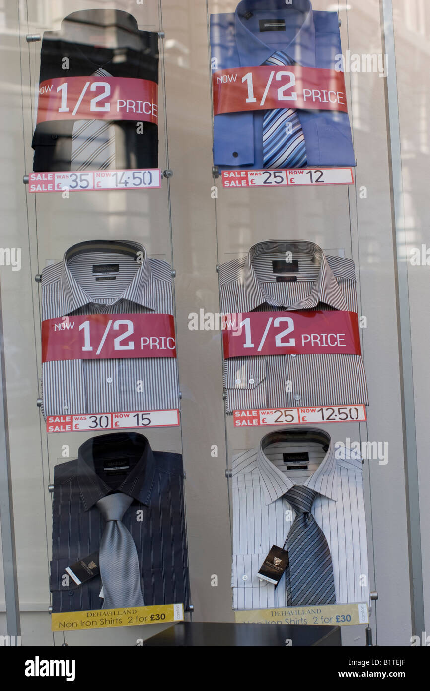 London price retail sale shirts in shop window with ties and half price ...