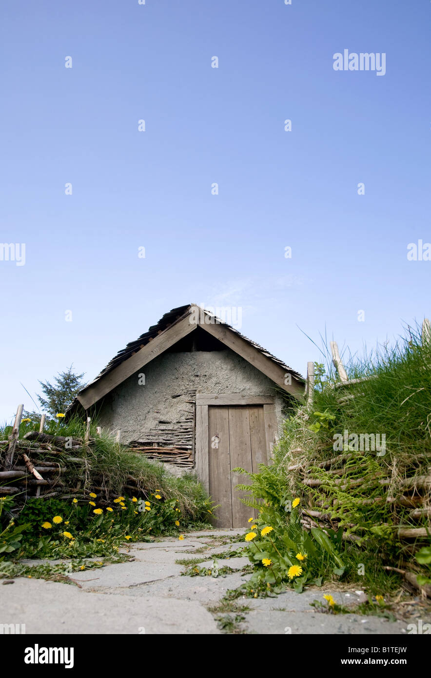 A small hermit cottage like building Stock Photo - Alamy