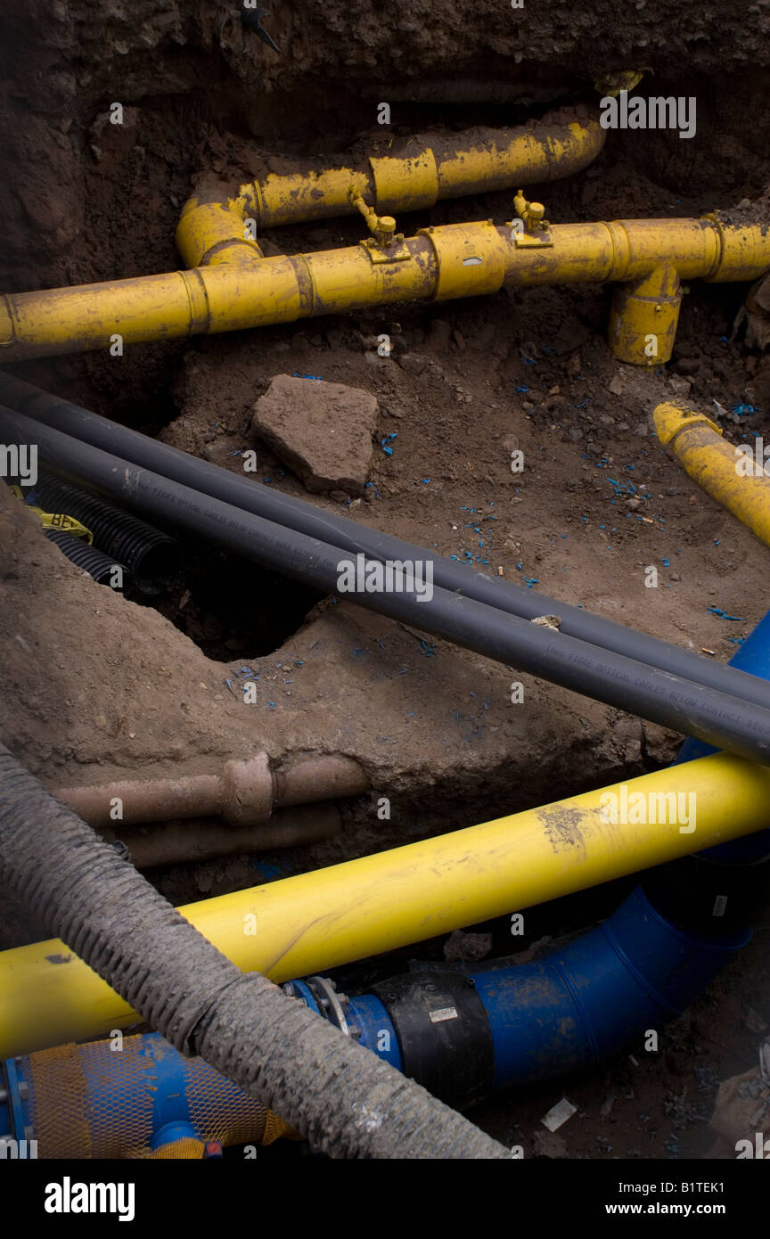 Moving and replacing utility pipes in connection with the installation ...