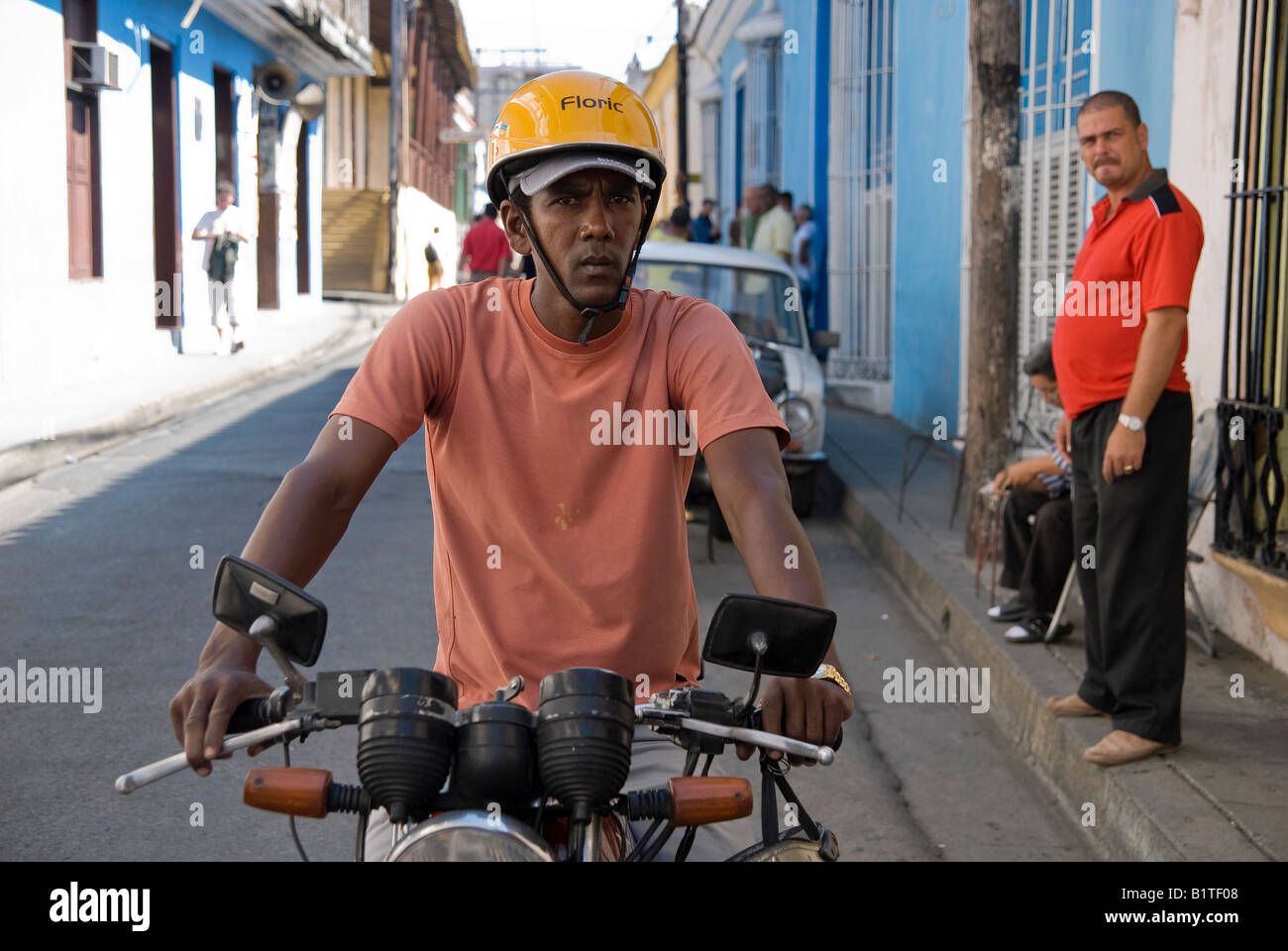 Motorbiker in Santiago de Cuba Stock Photo - Alamy