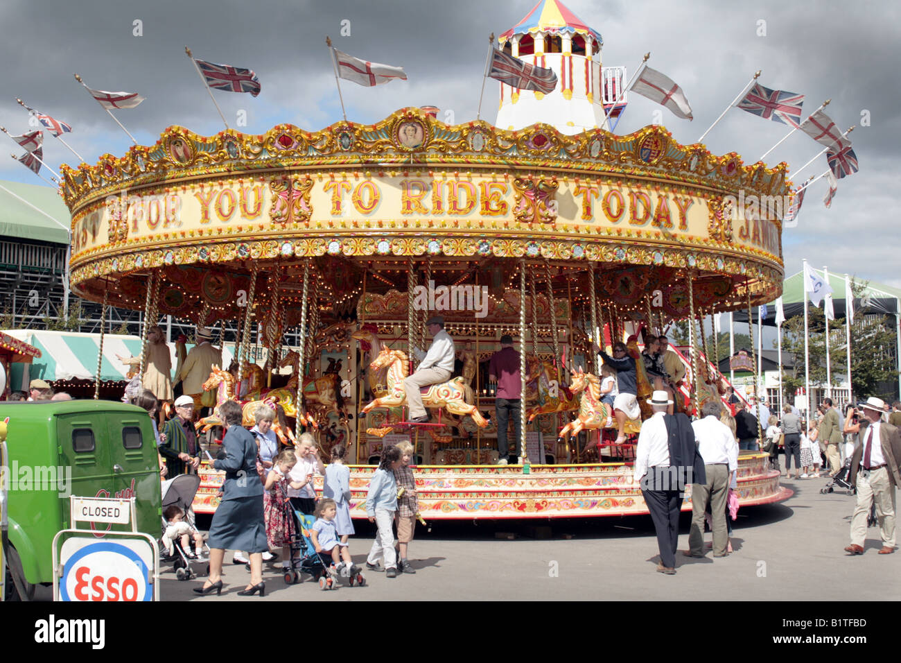 A fairground ride provides fun for both children and adults at the ...