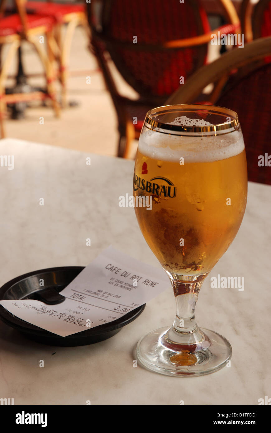 Cold beer with the bill Stock Photo - Alamy