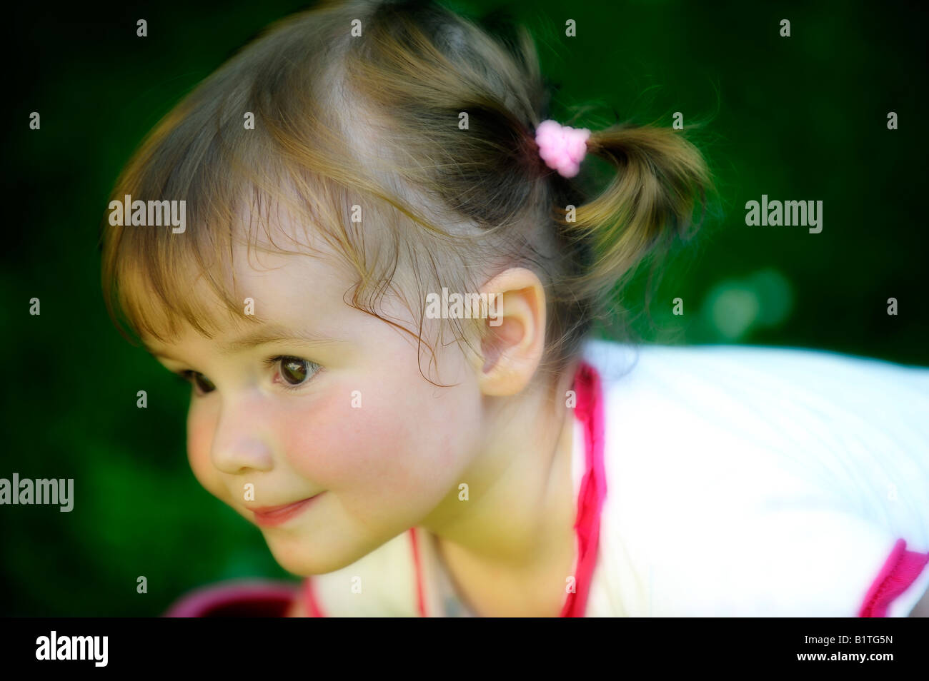 female baby toddler girl nineteen months one year old child pigtail ...