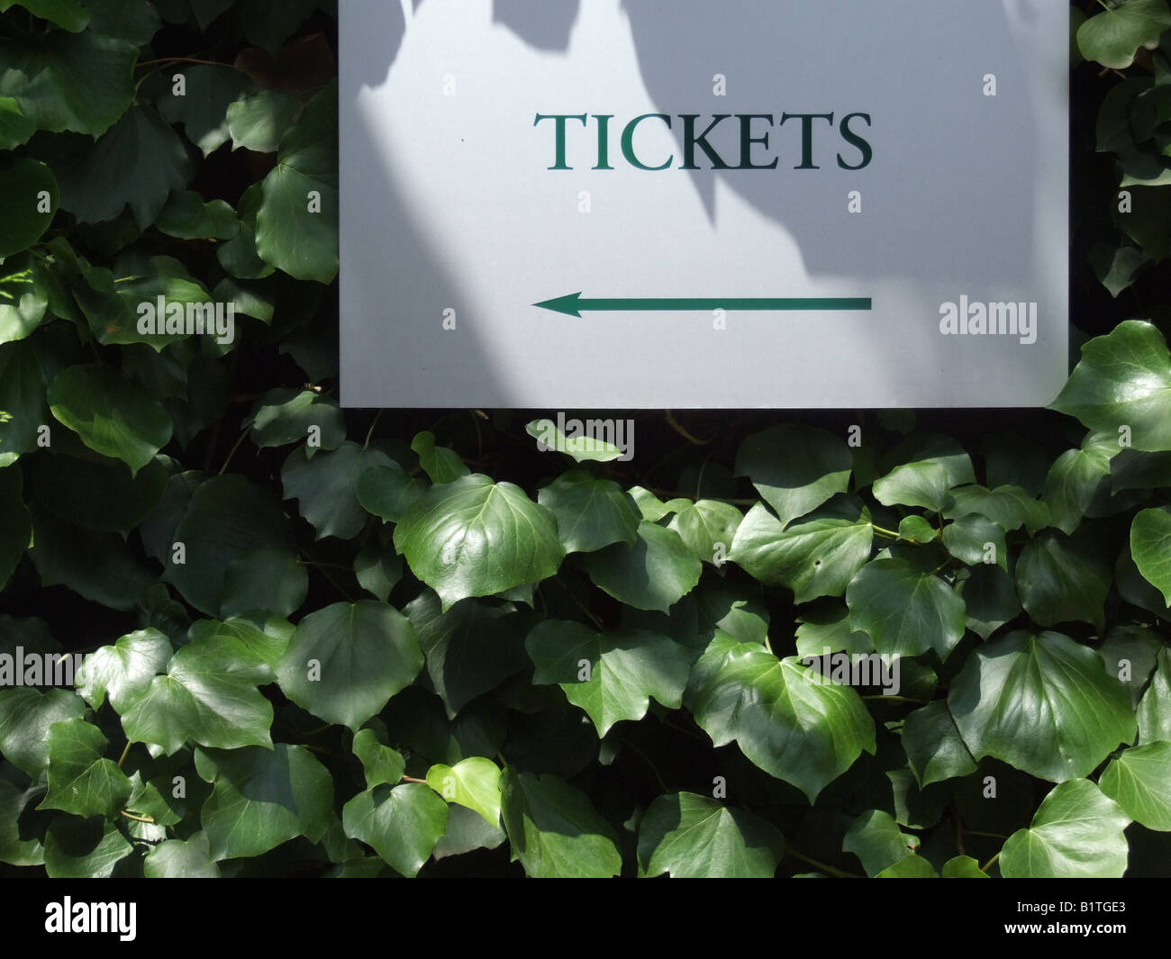 tickets sign notice with arrow outdoors Stock Photo - Alamy