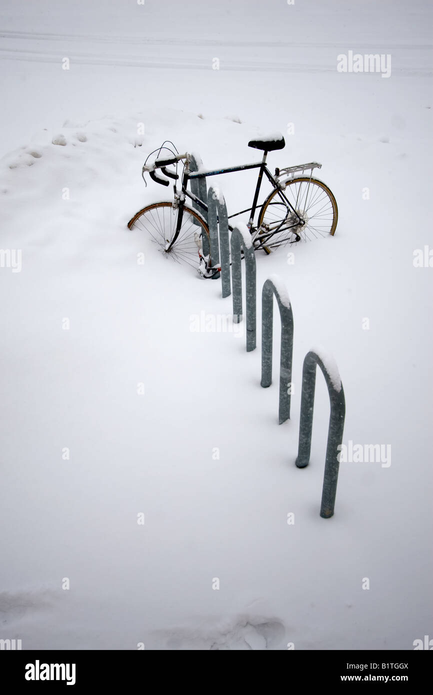 A bicycle is buried in snow from a large snowstorm in suburban Chicago ...