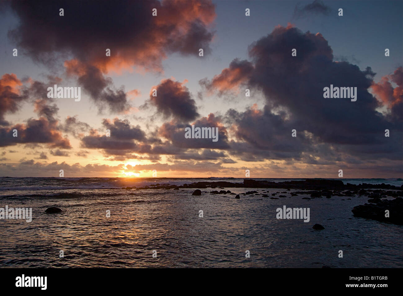 Colorful morning sunrise over the Hawaiian island of Kauai Stock Photo ...