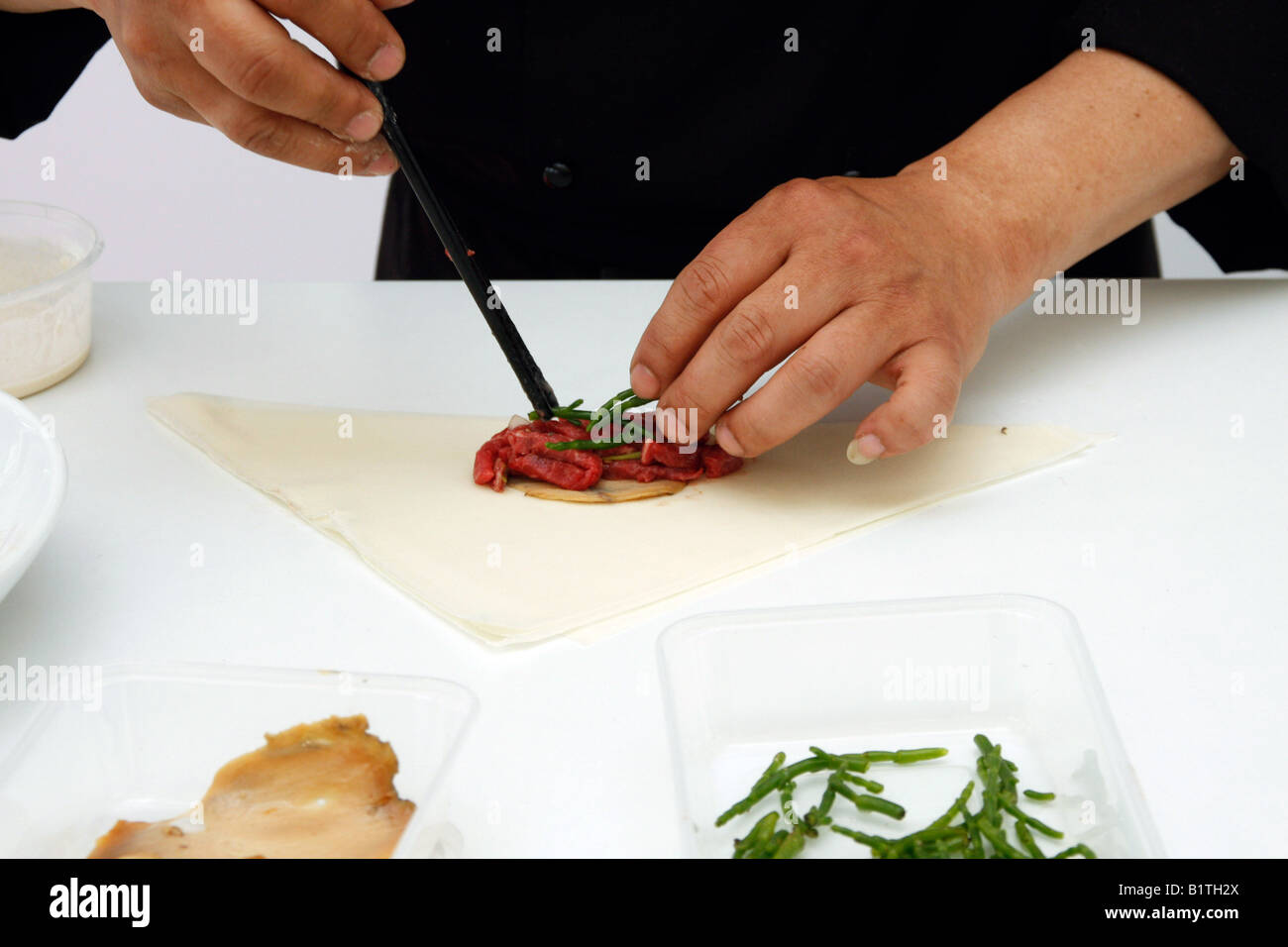 making a spring roll Stock Photo - Alamy