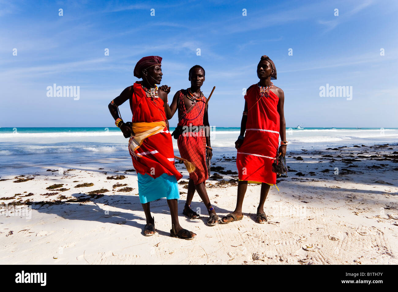 Three plastic Massai wearing traditional clothing at Diani Beach Coast ...