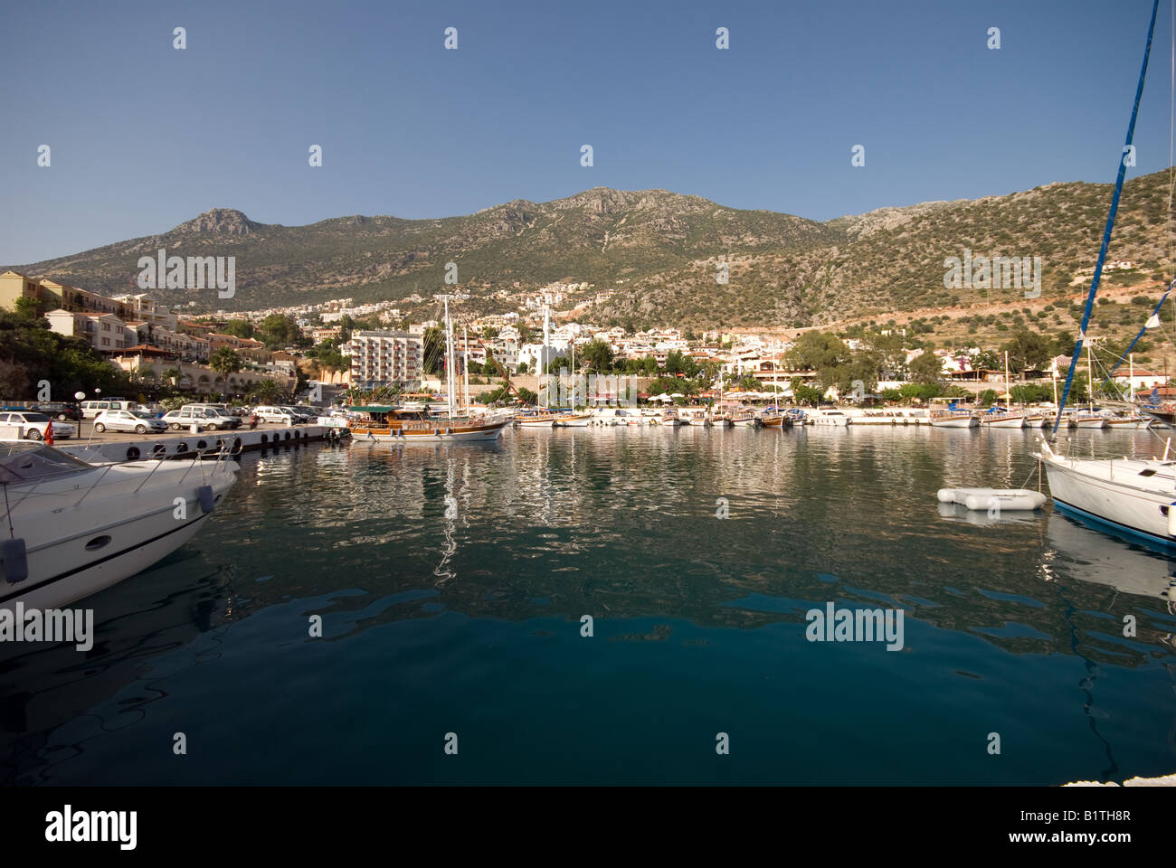 Kalkan in Turkey. A scenic photograph of a boating village on a hot ...