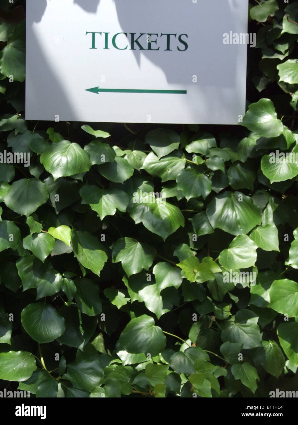 tickets sign notice with arrow outdoors Stock Photo - Alamy