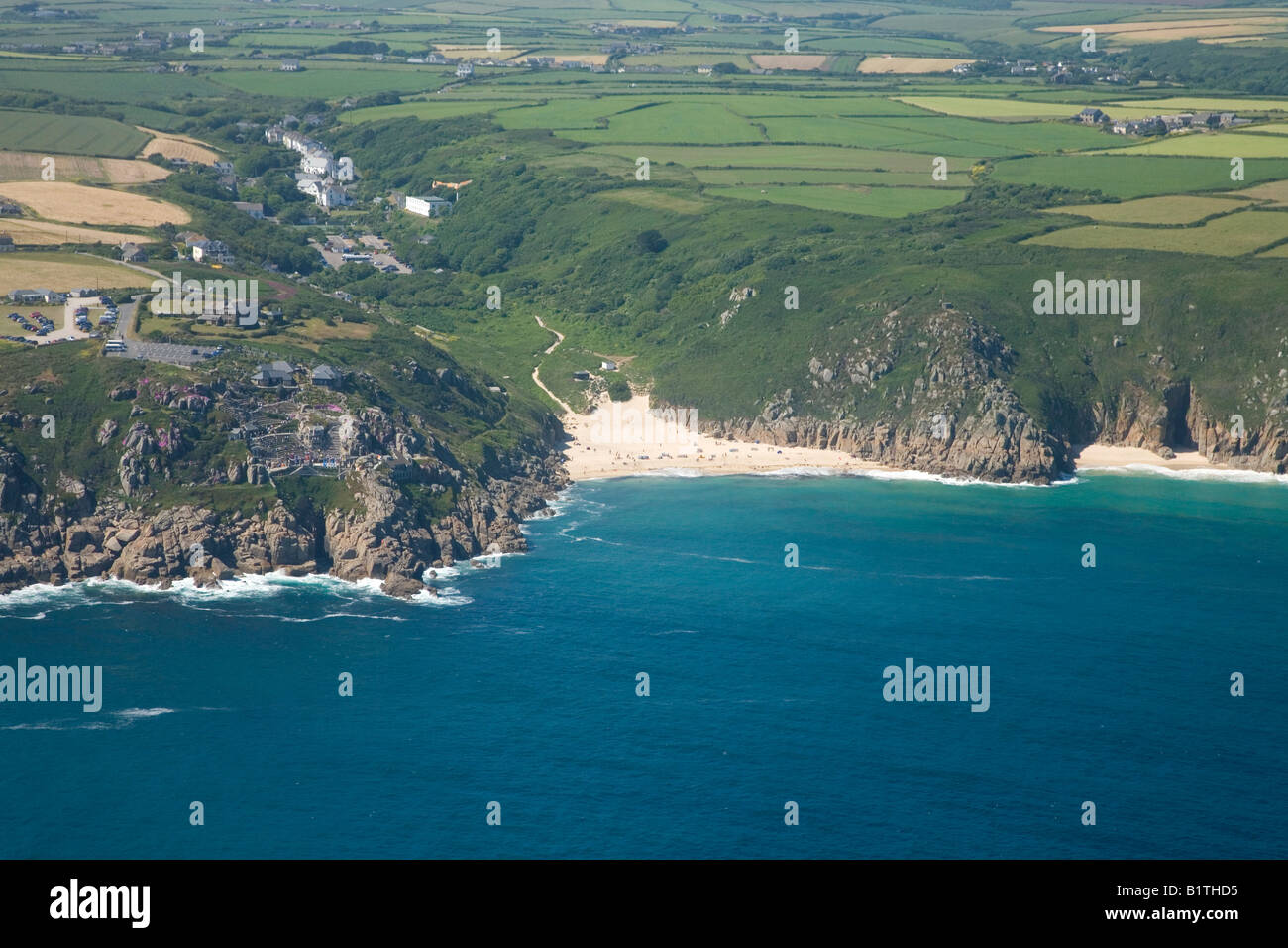 Minnack Theatre and Porthcurno beach aerial view West Penwith Cornwall ...