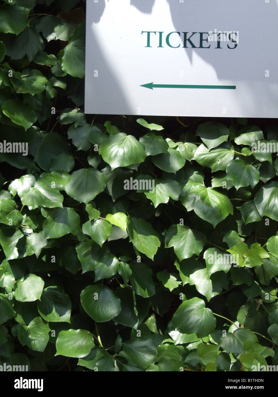 tickets sign notice with arrow outdoors Stock Photo - Alamy