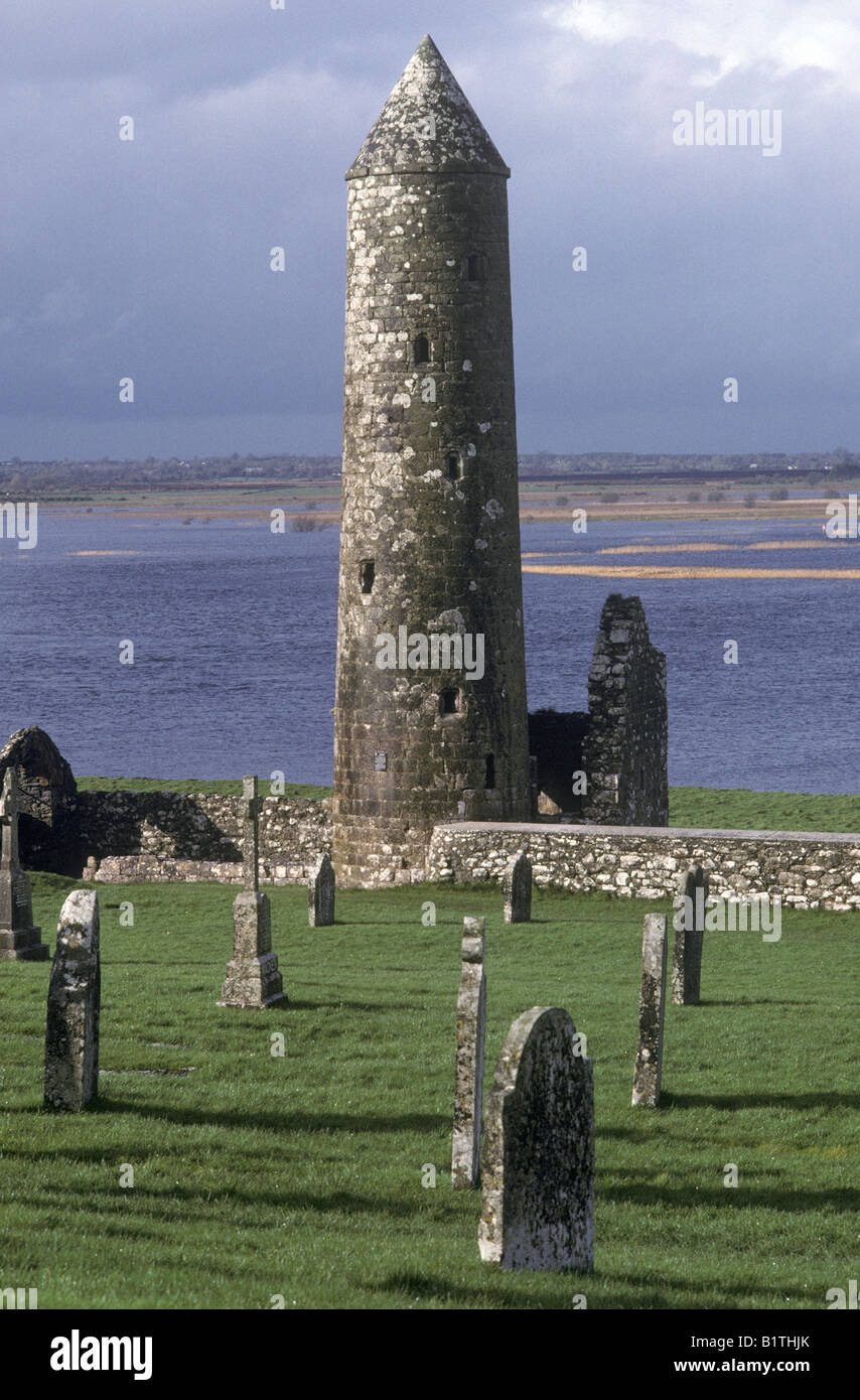 Round Tower at the Clonmacnoise Monastic site with the Shannon River in ...
