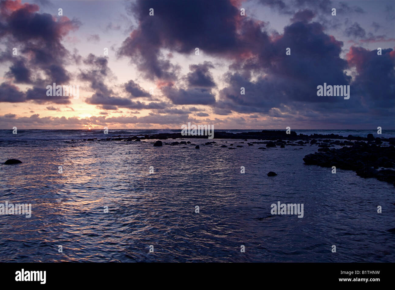 Colorful morning sunrise over the Hawaiian island of Kauai Stock Photo ...