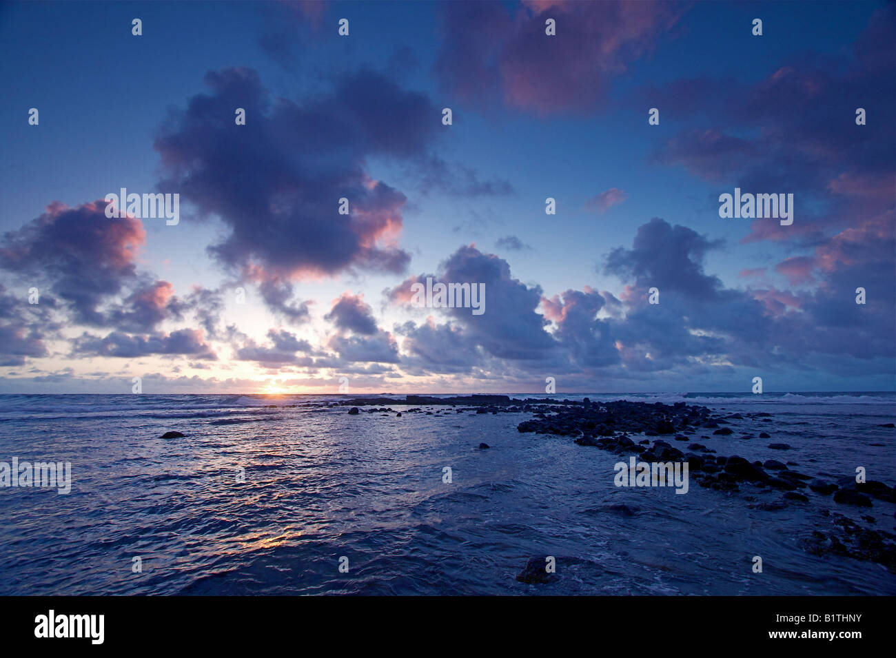 Colorful morning sunrise over the Hawaiian island of Kauai Stock Photo ...