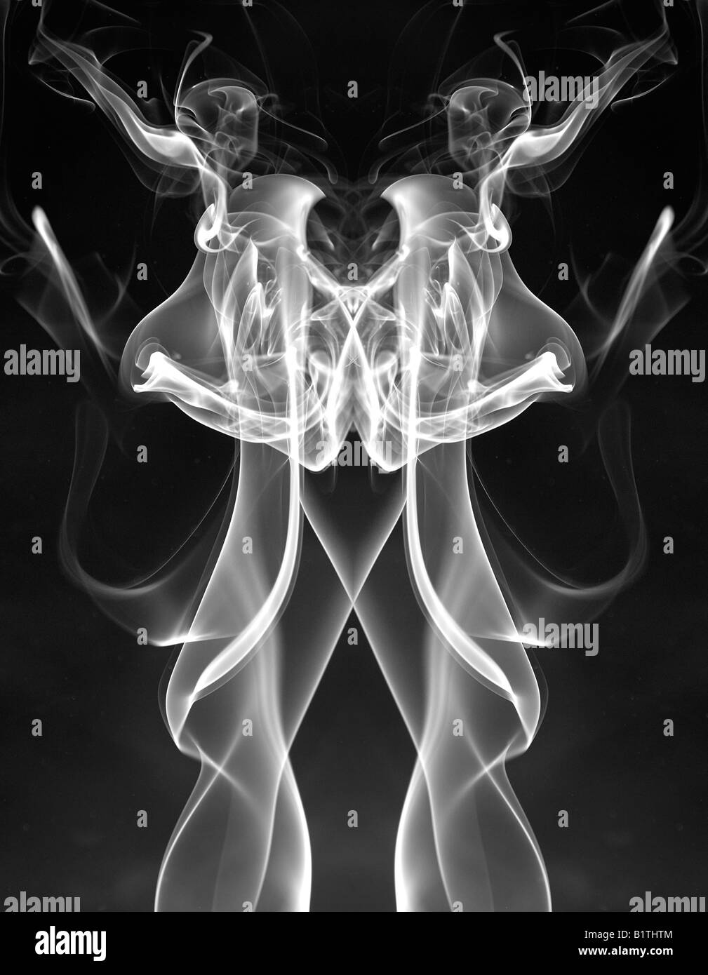 White smoke pattern from a burning incense stick. It's been duplicated ...