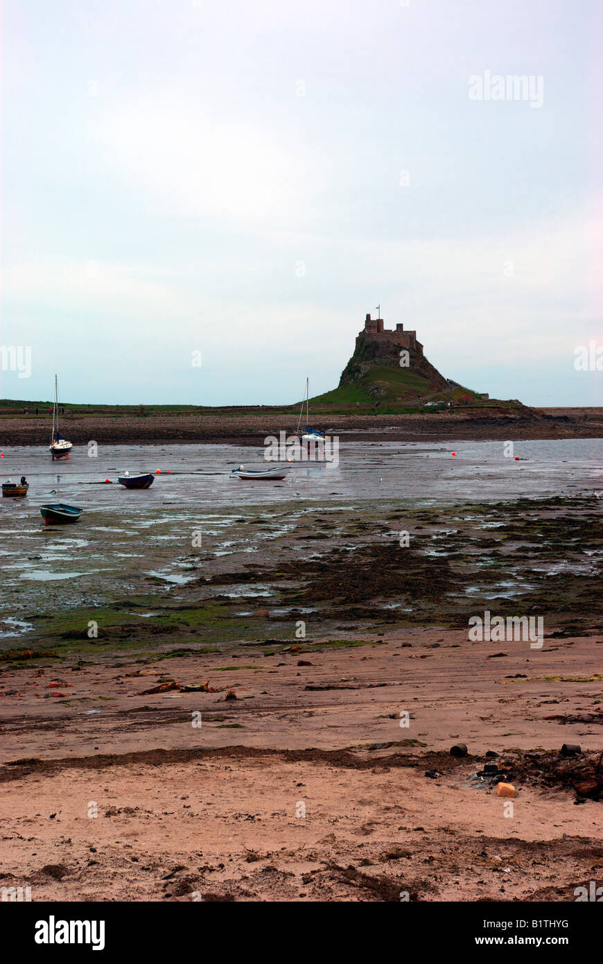 Fishing boats holy island beach hi-res stock photography and images - Alamy