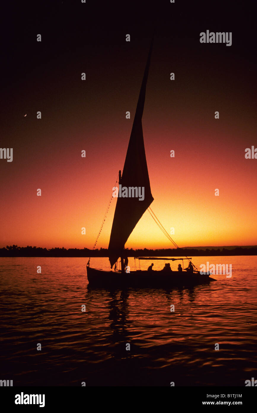 Felucca (Egyptian sailing craft) On the River Nile Egypt, at sunset ...