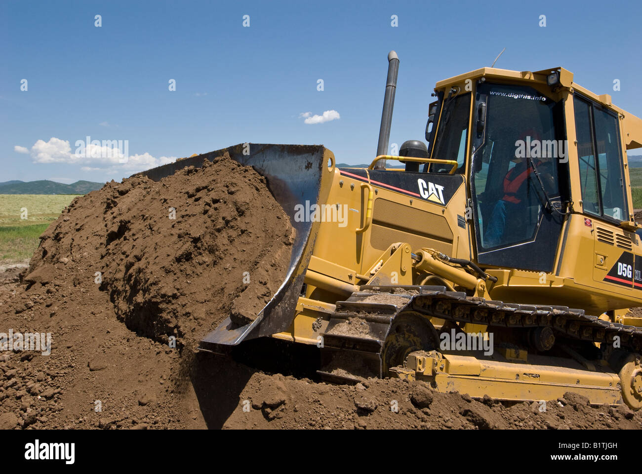 Female caterpillar track hi-res stock photography and images - Alamy