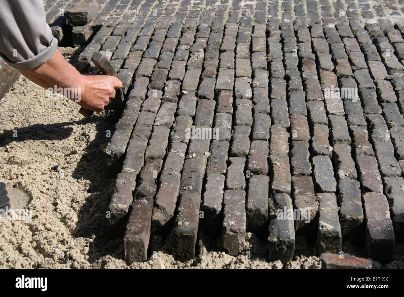 Worker repairing a road hi-res stock photography and images - Alamy