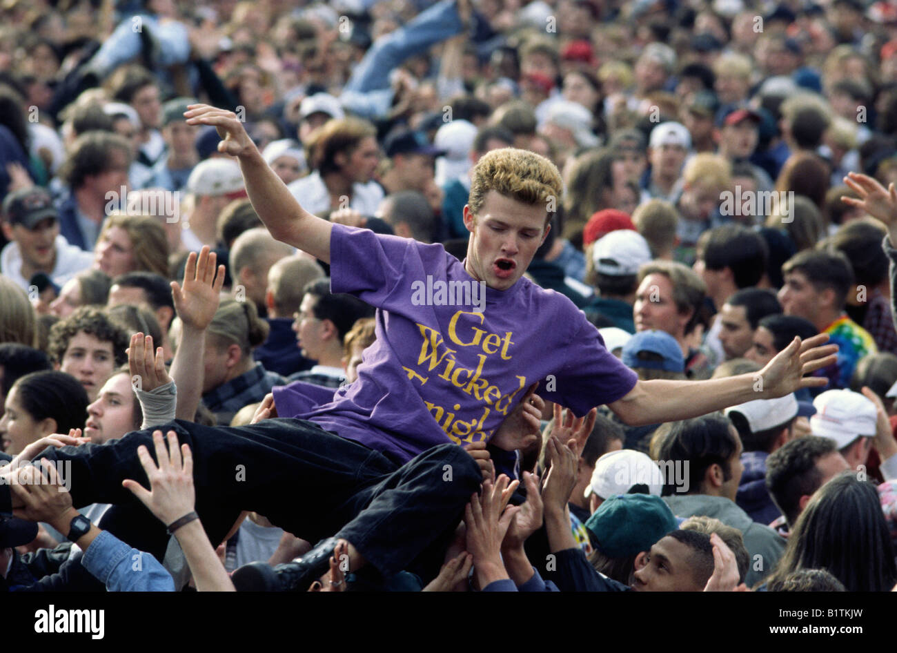 Crowd surfing, rock concert Stock Photo - Alamy