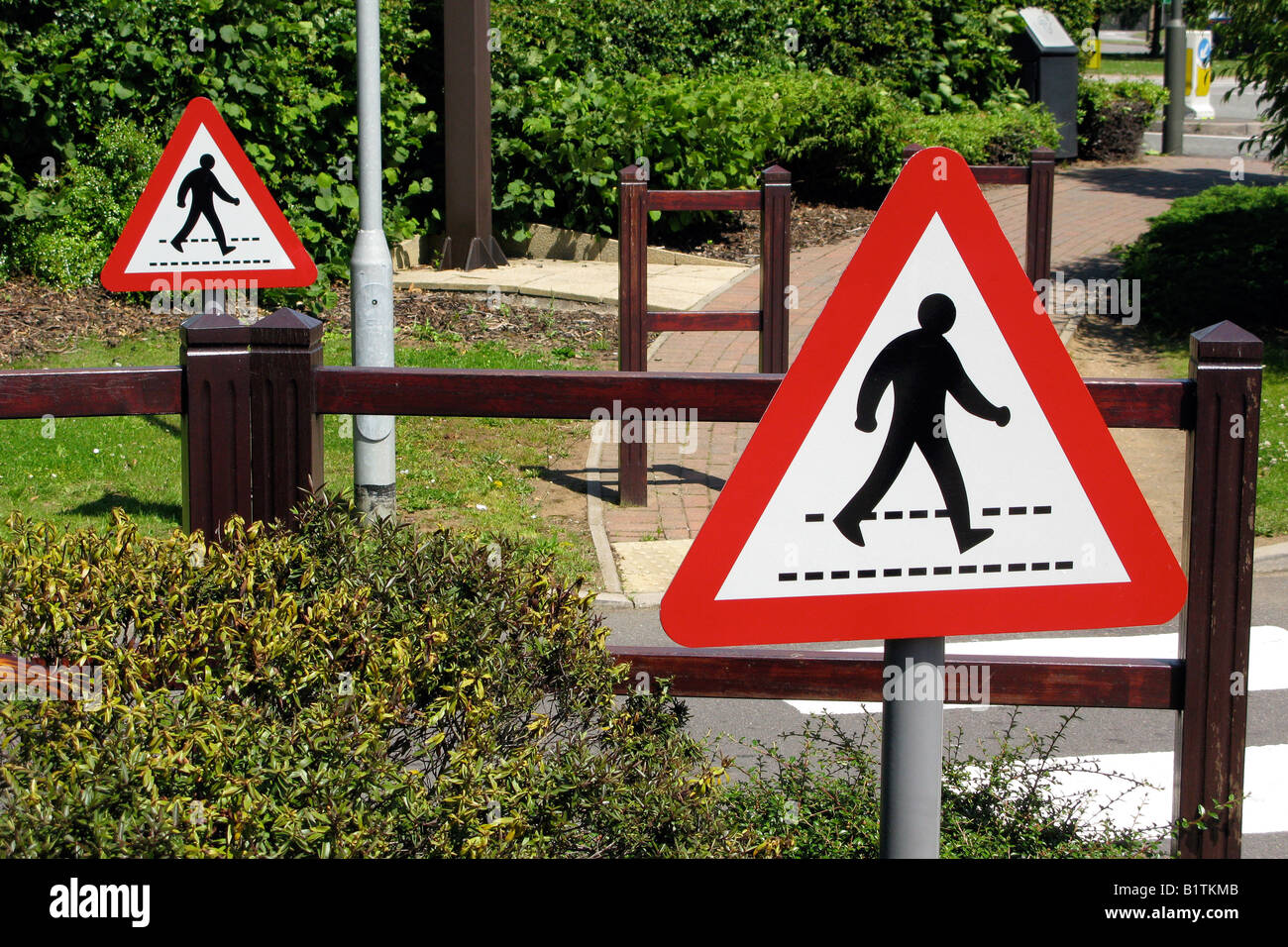 Red Triangle featuring a figure of a walking man on safety crossing ...