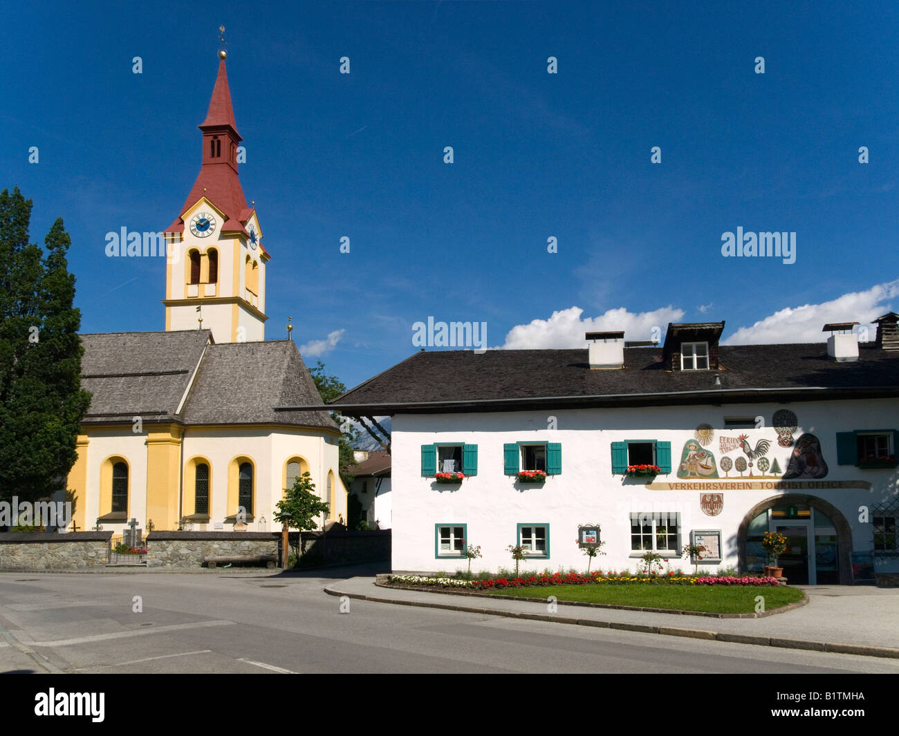 The church and the Tourist Office in the village of Igls near Innsbruck ...