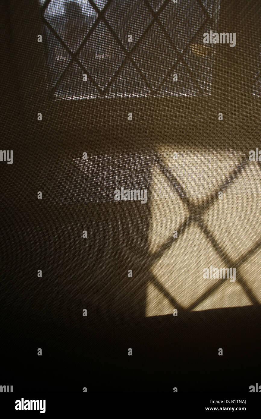 Abstract window grill shadow inside hi-res stock photography and images ...