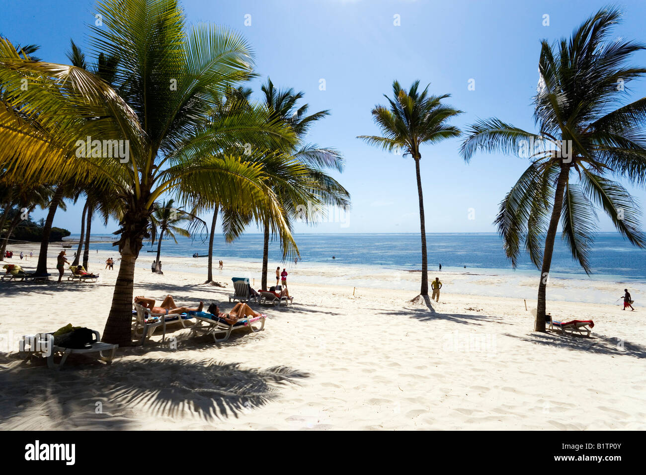 Tourists relaxing at Shanzu beach Coast Kenya Stock Photo - Alamy