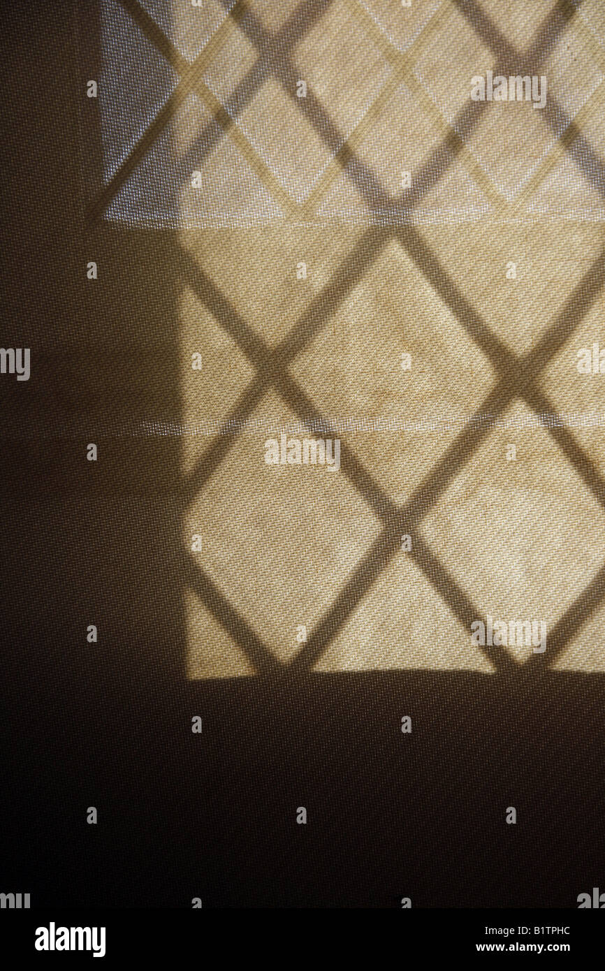 Abstract window grill shadow inside hi-res stock photography and images ...