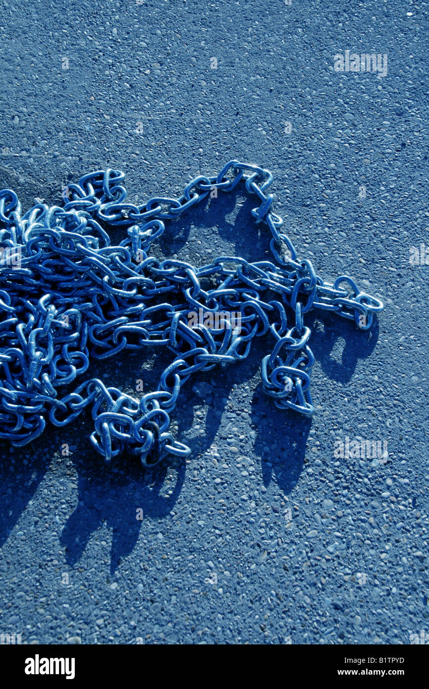 detail of metal chain on floor outdoors Stock Photo - Alamy