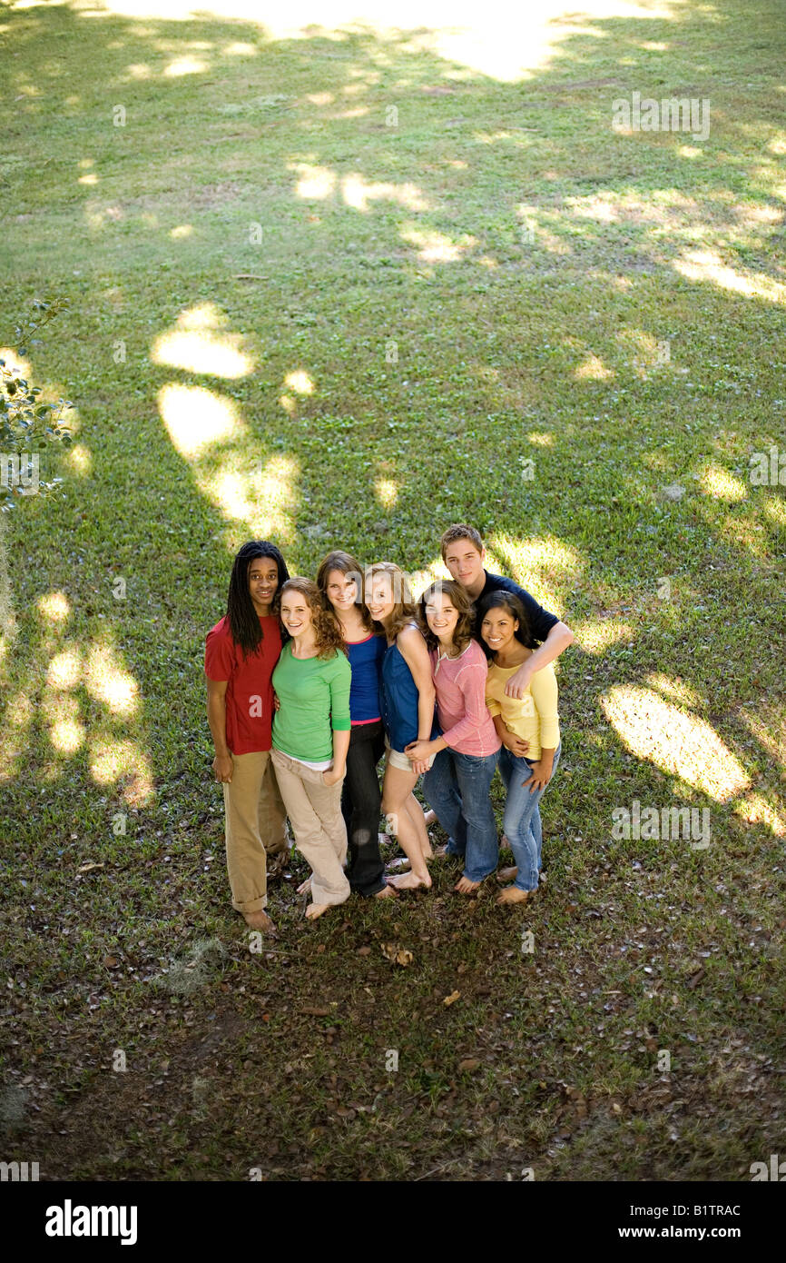 A group of friends on the grass together Stock Photo - Alamy