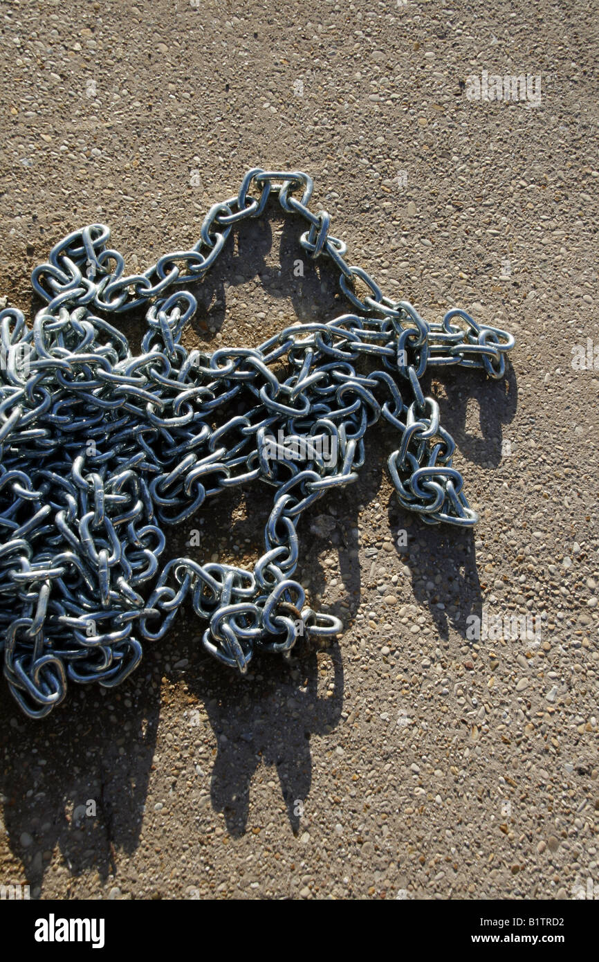 detail of metal chain on floor outdoors Stock Photo - Alamy