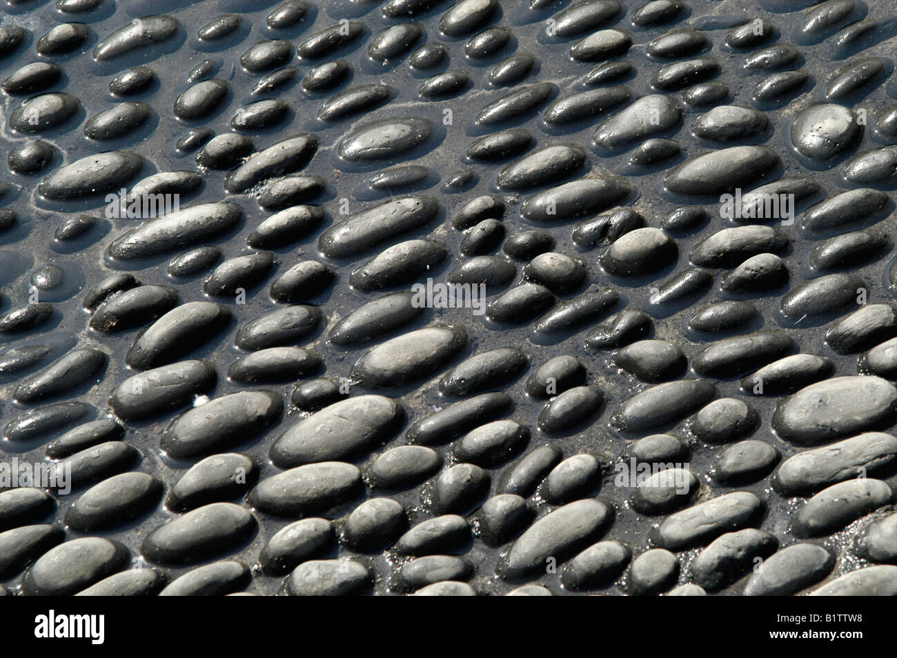 Pebble detail on floor, Los Angeles, California, USA Stock Photo - Alamy