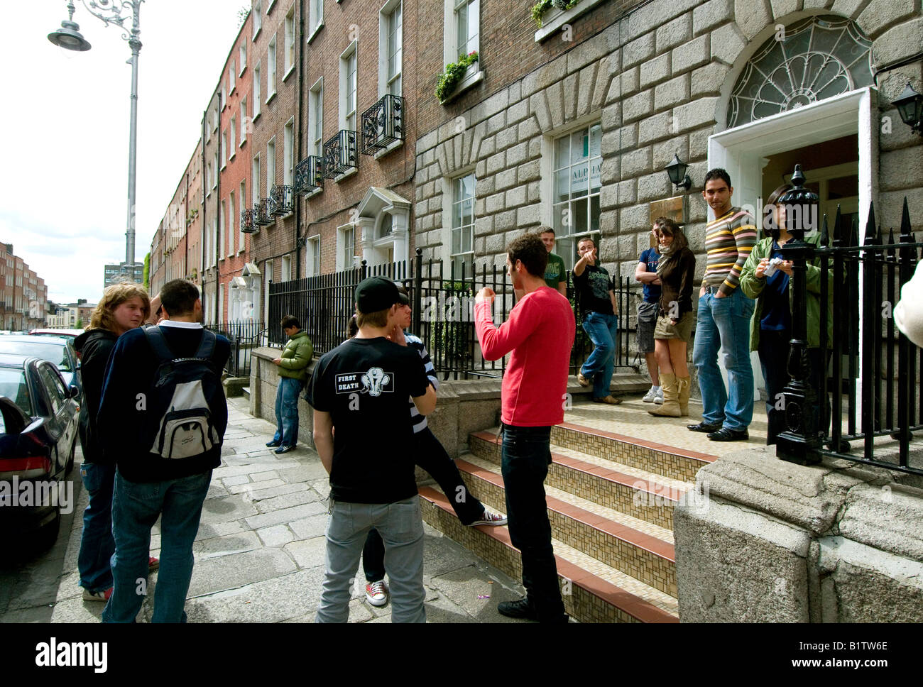 Students gather on the steps of a language school on North Great ...