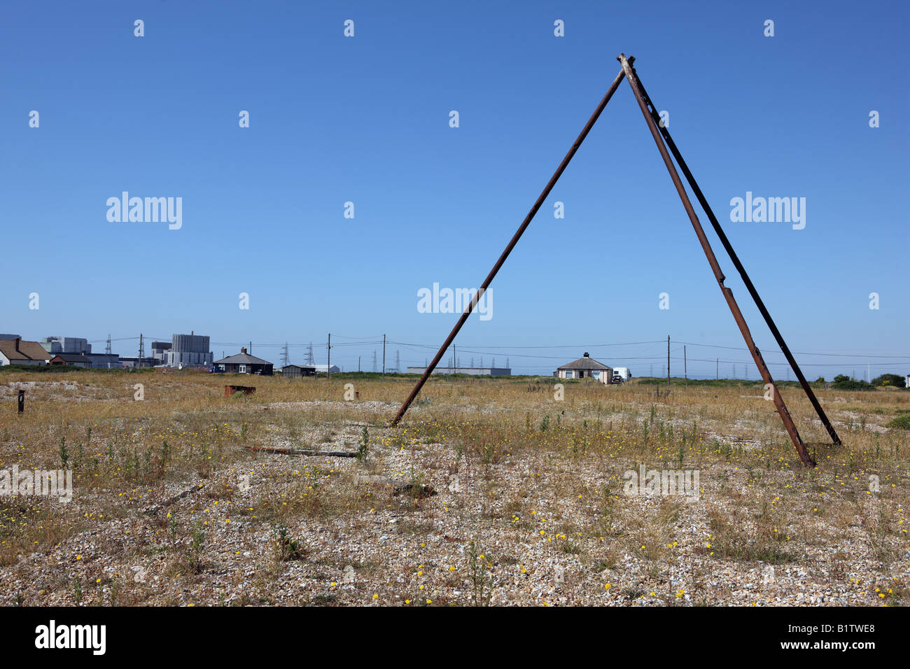 Iron pyramid like sculpture, on shingle beach Stock Photo - Alamy