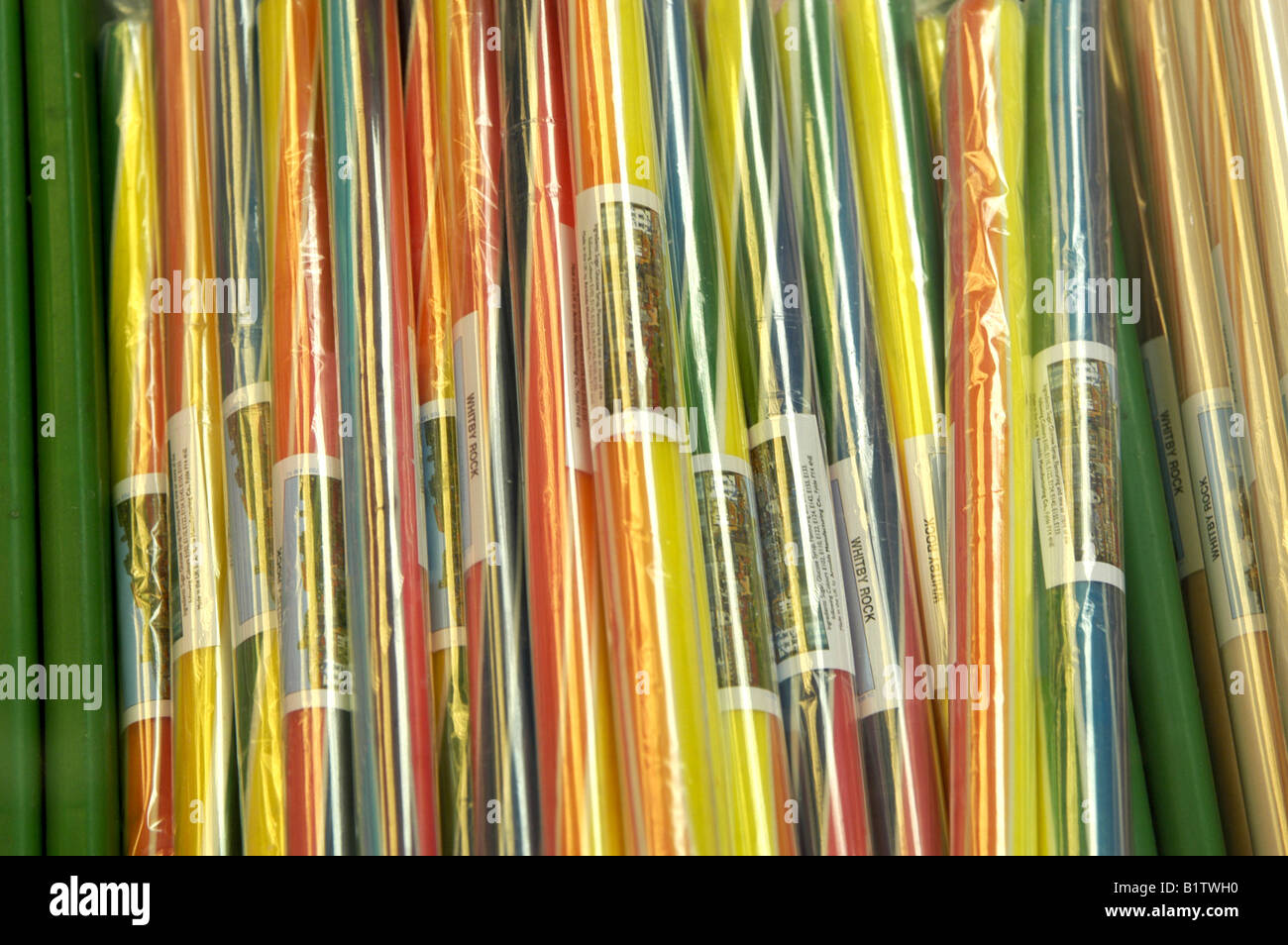 Sticks of coloured confectionary rock/ candy, Whitby Harbour, North ...