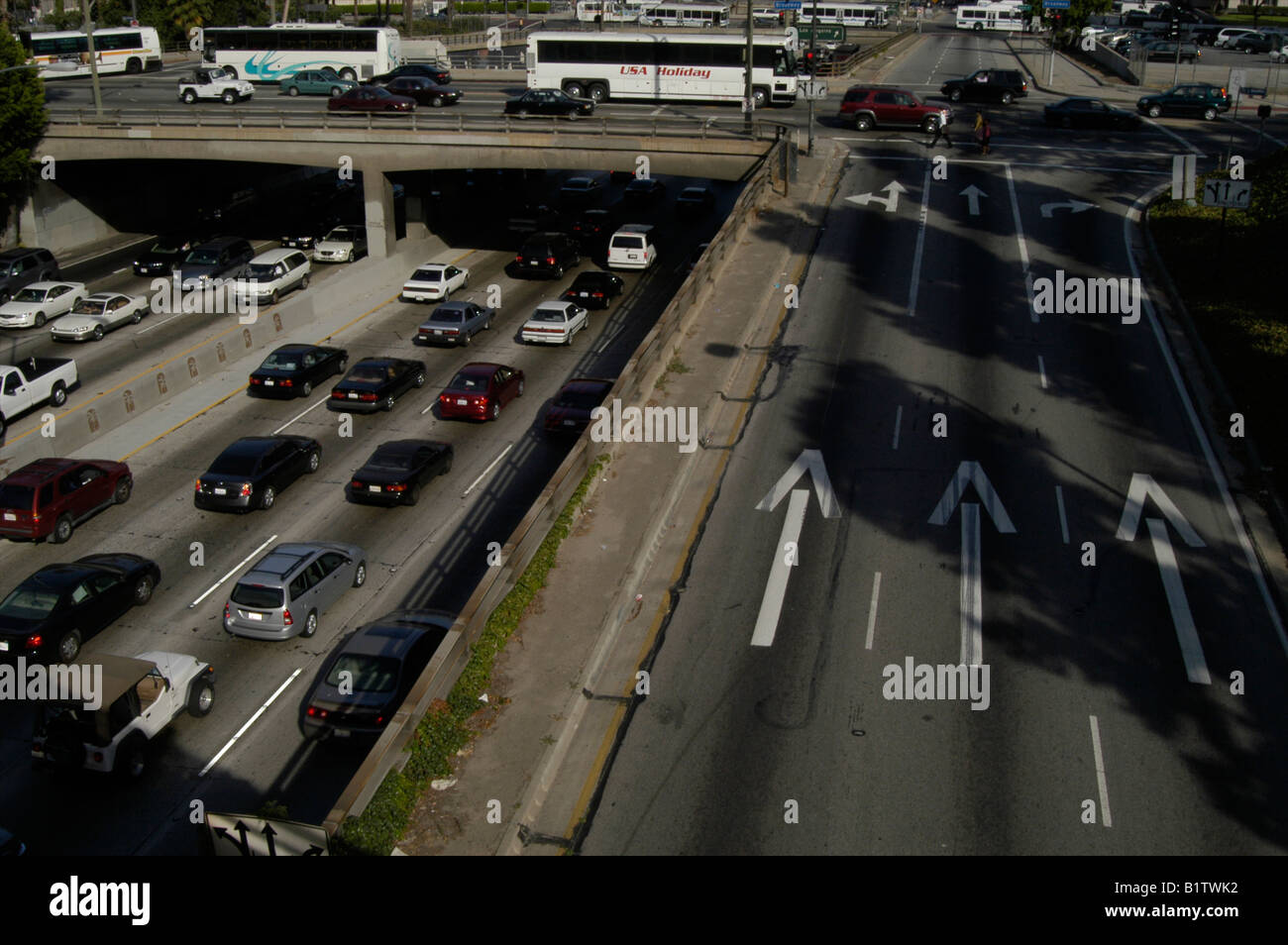 Three road arrows on freeway, Los Angeles, California, USA Stock Photo ...