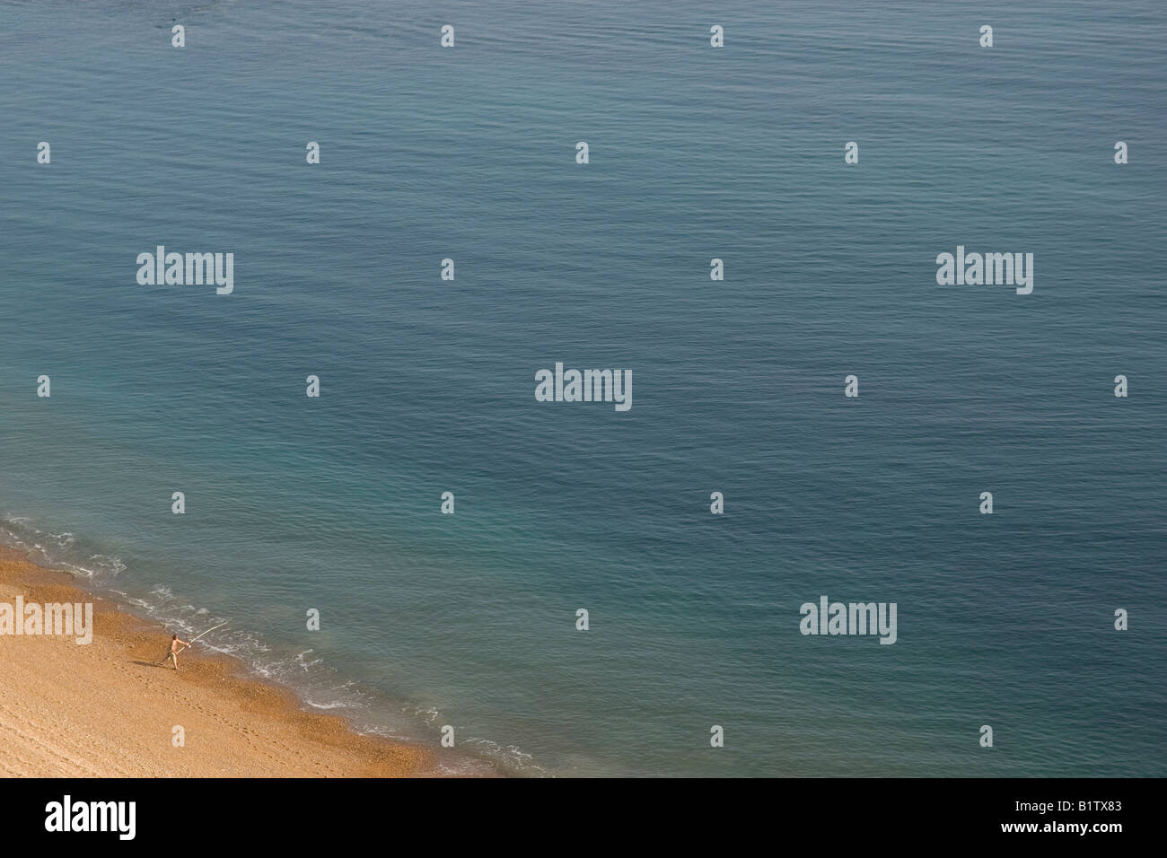Angler from above, Seatown, Dorset, England, United Kingdom, Europe ...