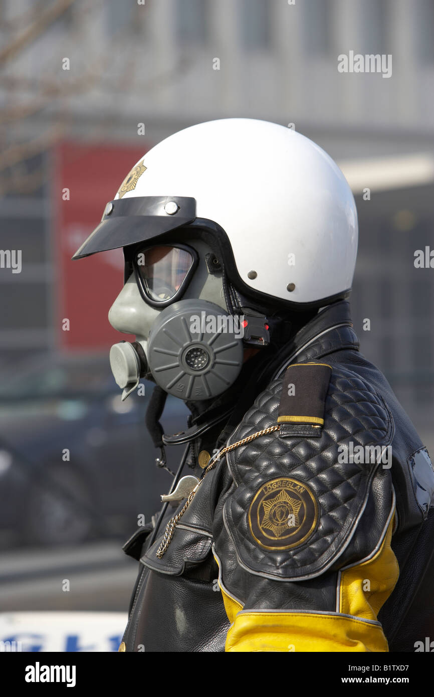 Police man wearing mask, fire in Reykjavik, Iceland Stock Photo - Alamy