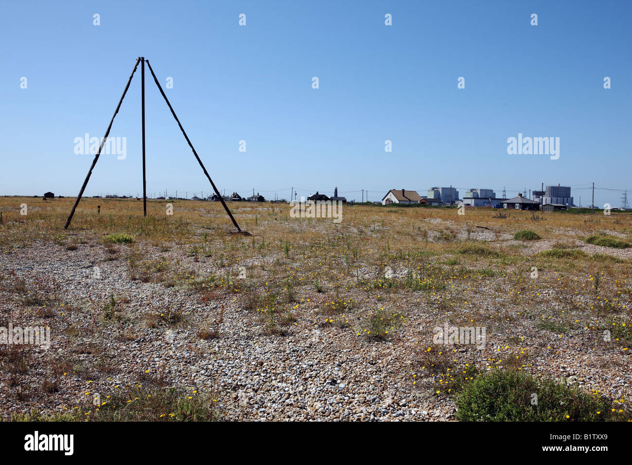 Iron pyramid like sculpture, on shingle beach Stock Photo - Alamy
