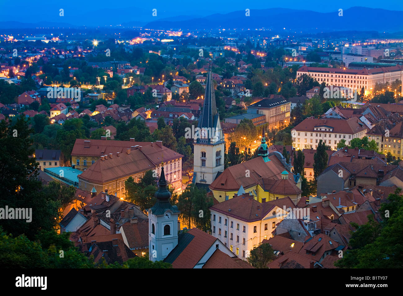 Capital city of Slovenia. Photo is shot at the night from a hill above ...