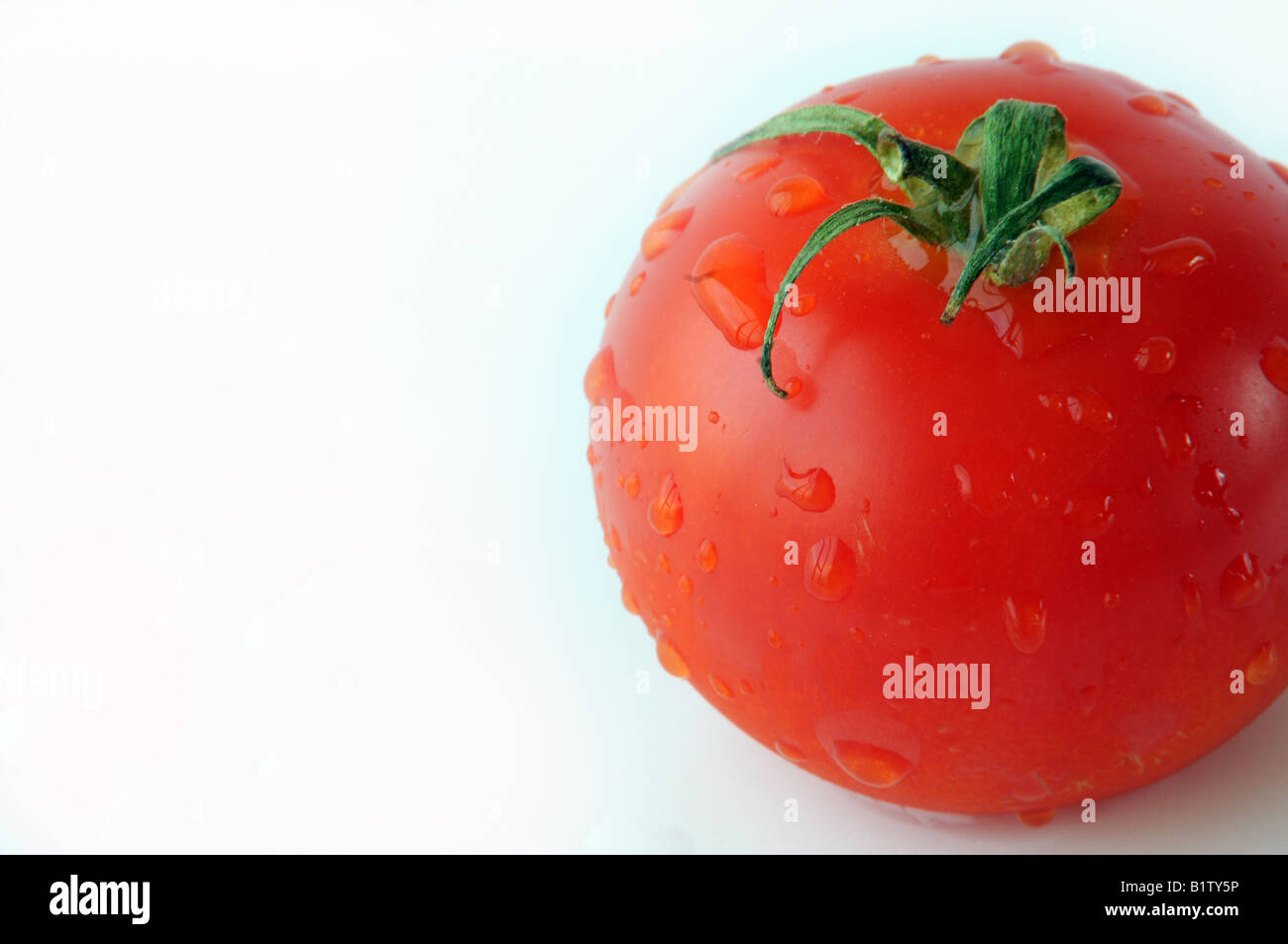 Single Organic Tomato Stock Photo - Alamy