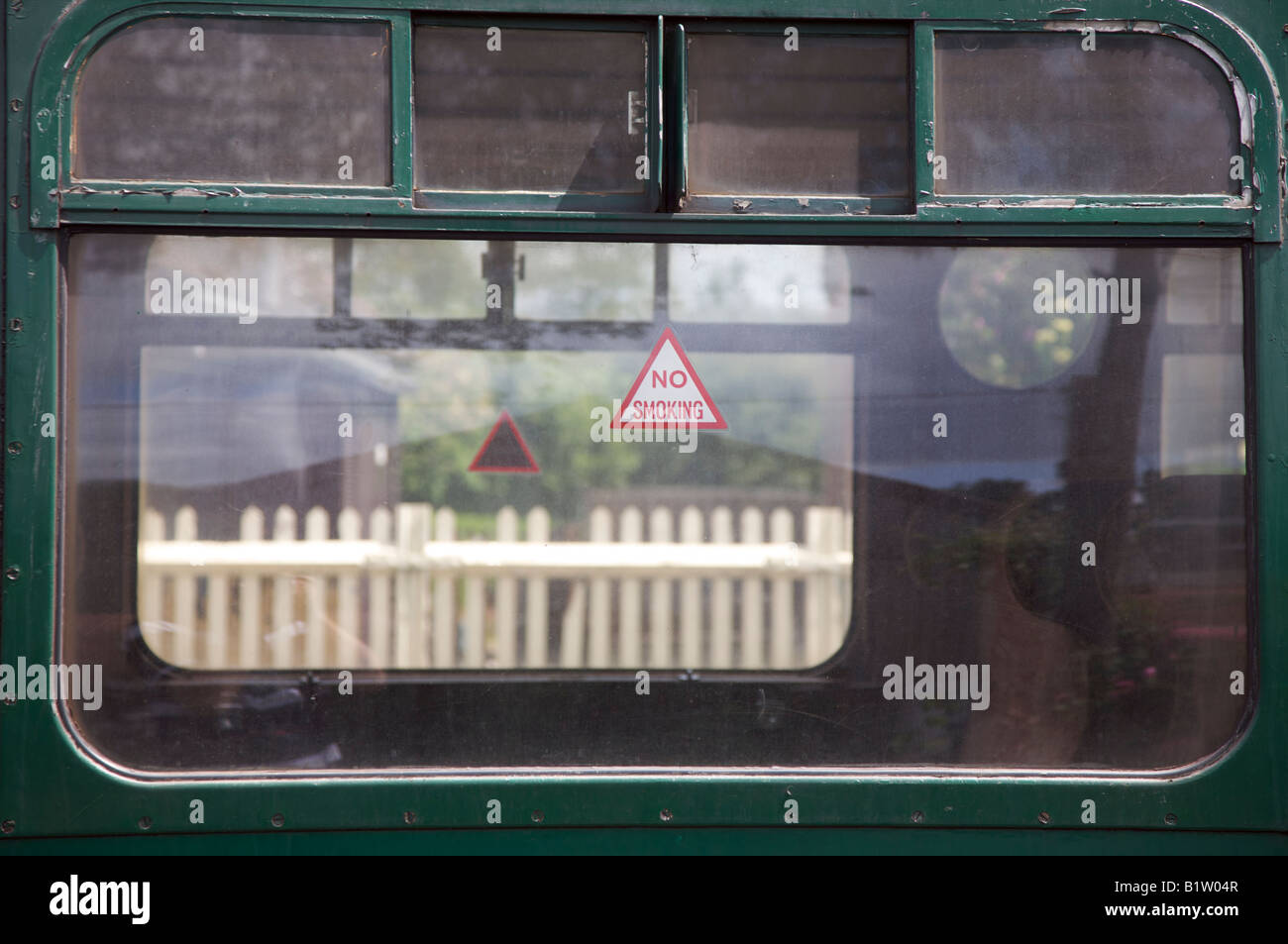 NO SMOKING SIGN ON AN OLD RAILWAY CARRIAGE COMPARTMENT WINDOW Stock ...