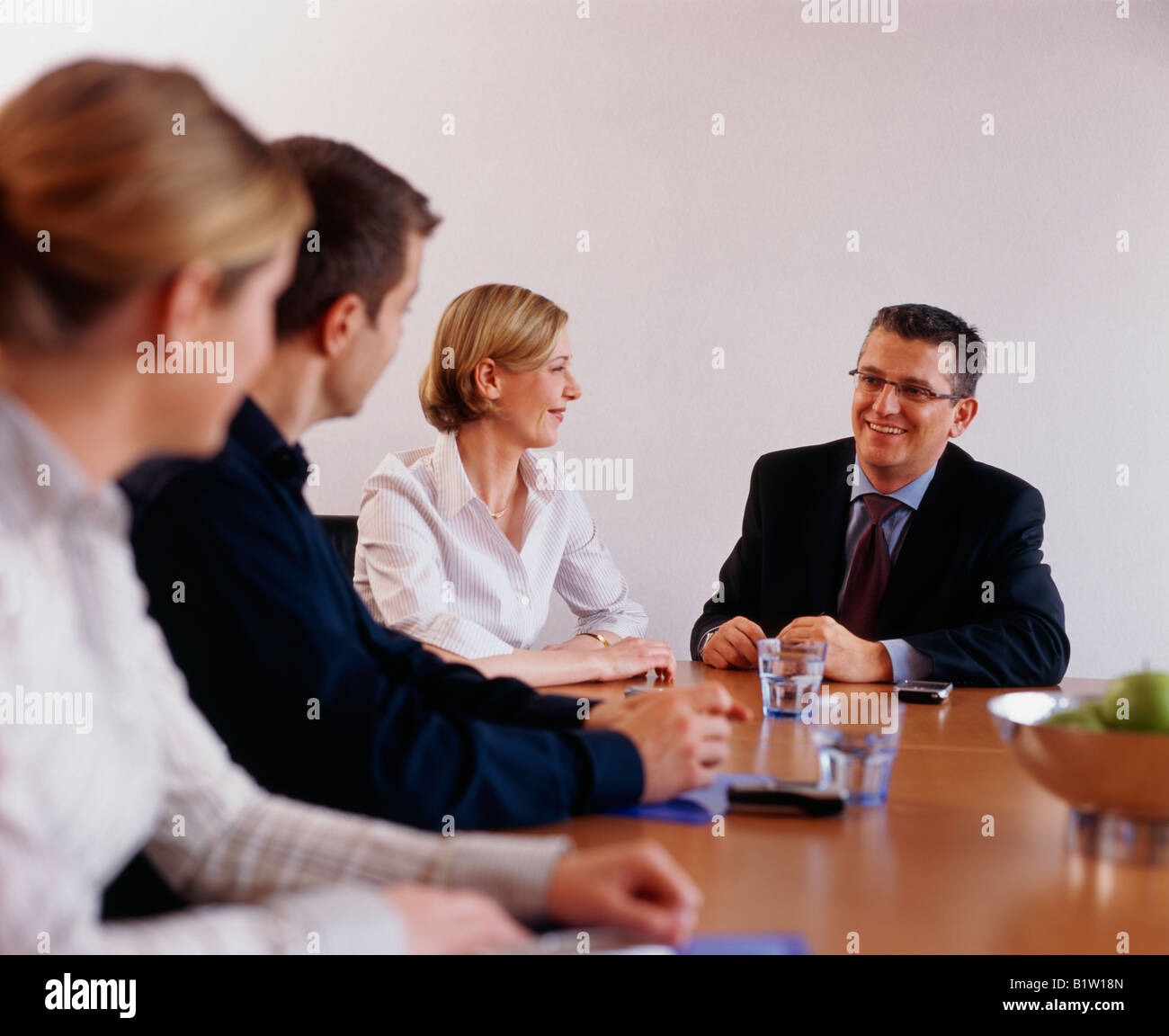 business meeting at conference table dialogue Stock Photo - Alamy