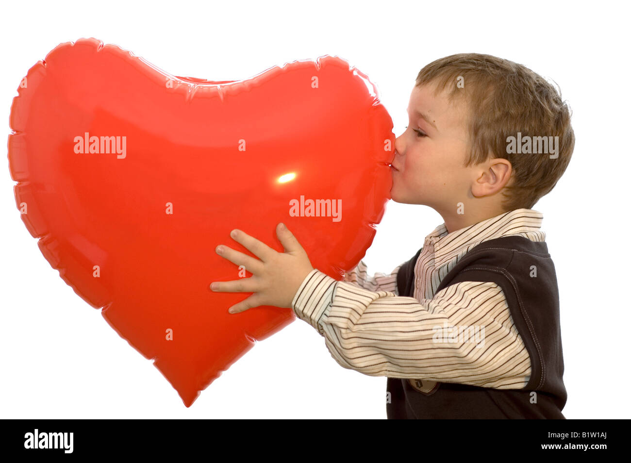 little 5 year old holding a heart Stock Photo - Alamy