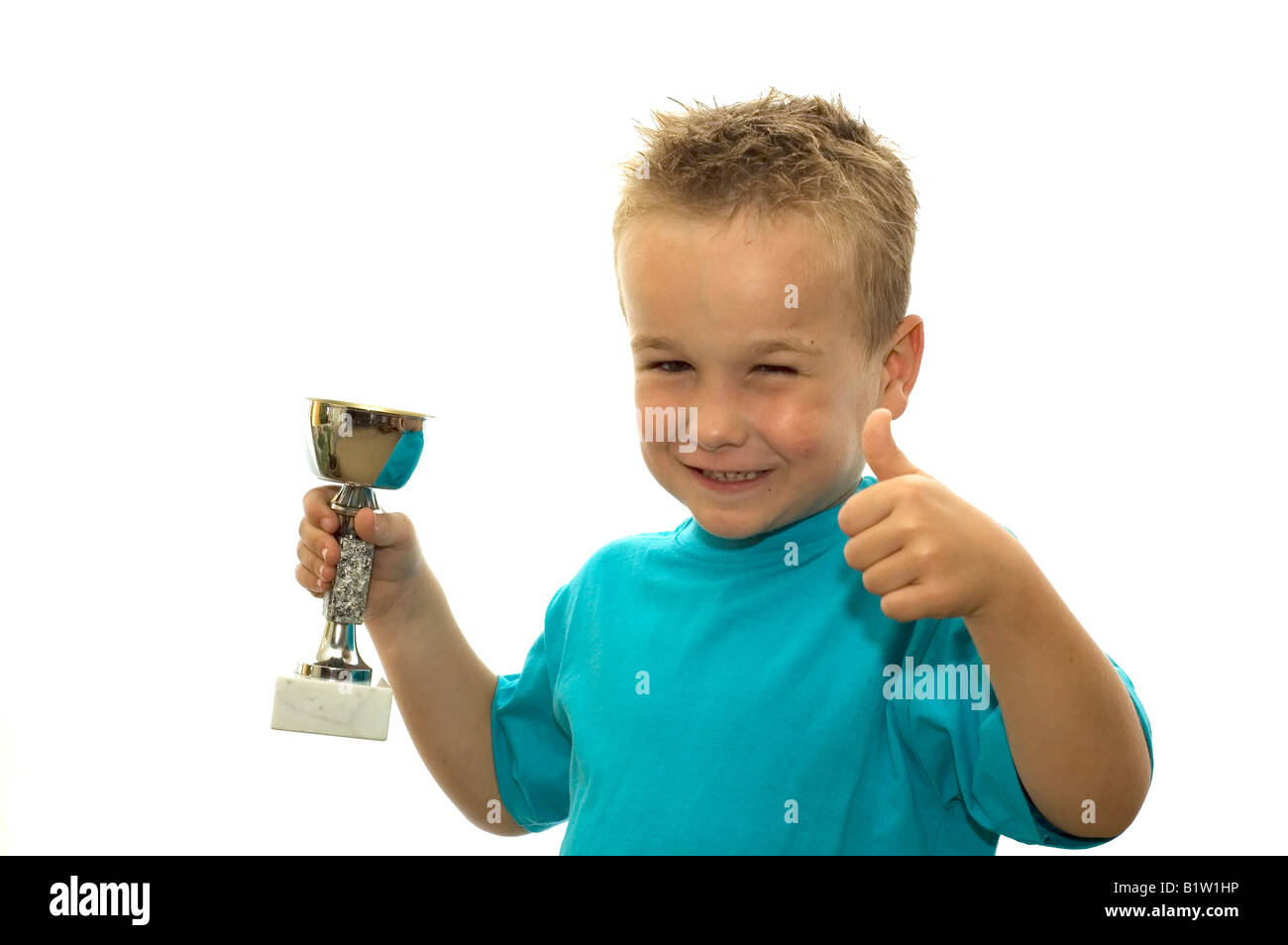 Boy has won his first cup final he is very proud Stock Photo - Alamy